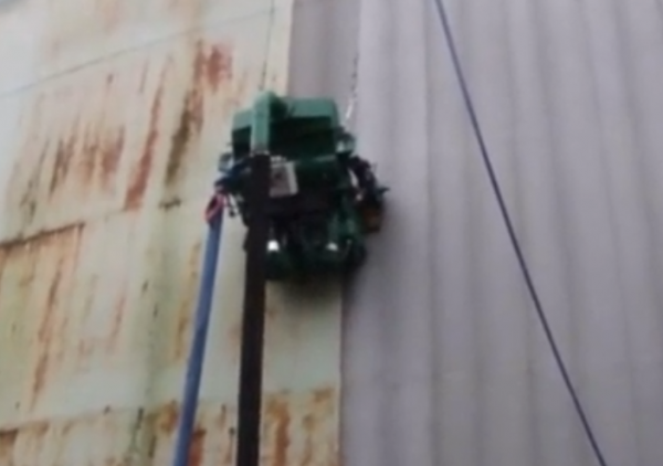 A robotic blast cleaner Fasterblaster clean the vertical inner and ...